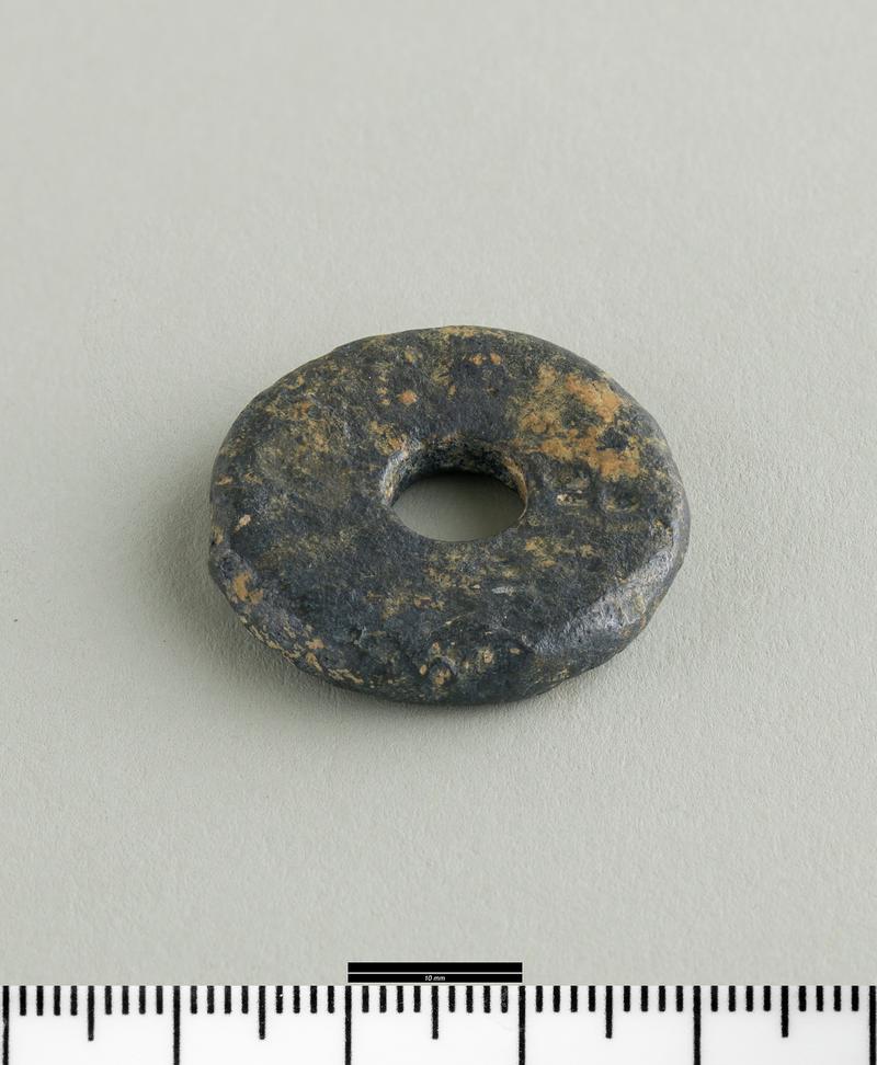 Early Medieval lead spindle whorl - Collections Online